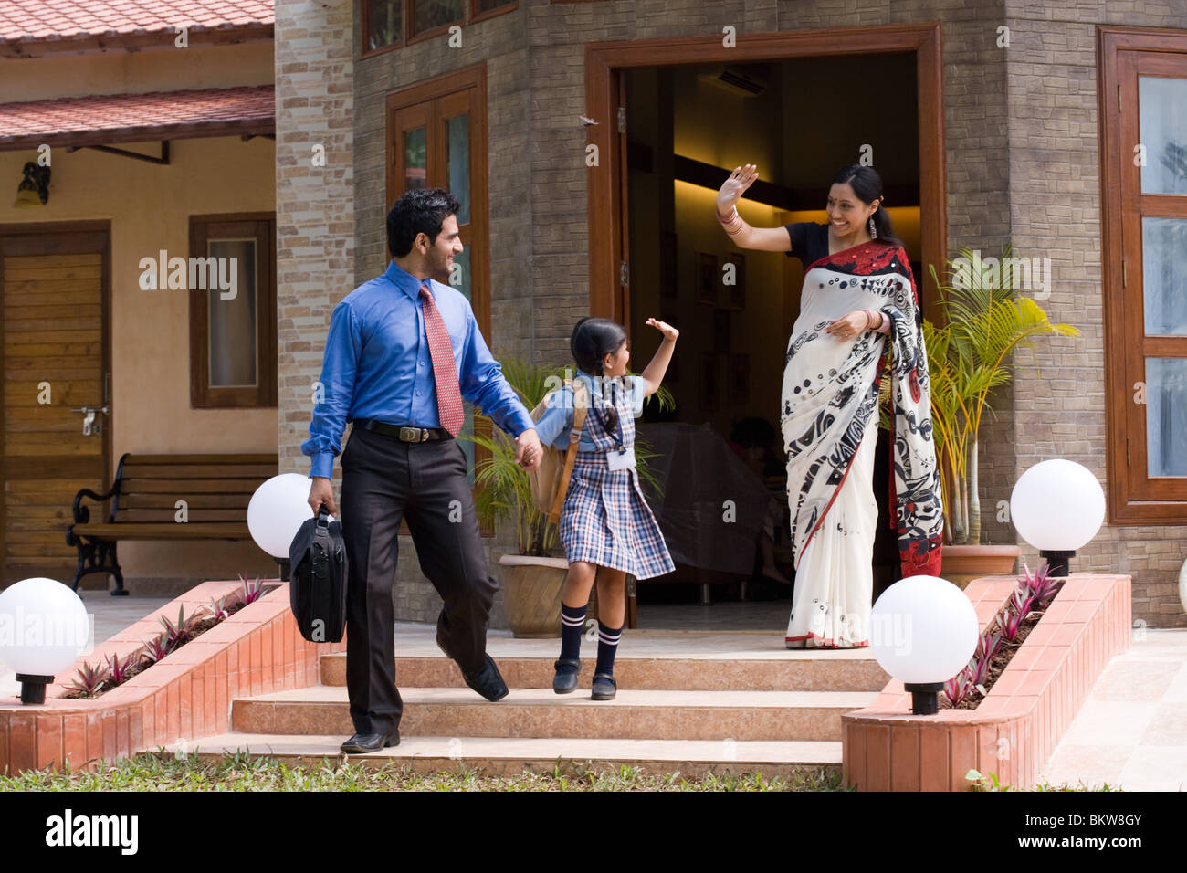 Child going to school waving hi-res stock photography and images - Alamy
