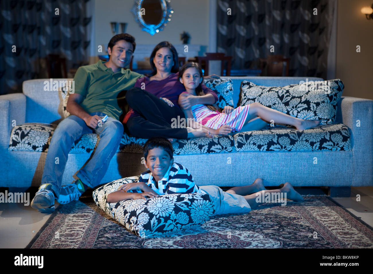 Family watching television Stock Photo - Alamy