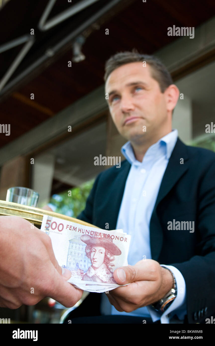 Man with money Stock Photo - Alamy