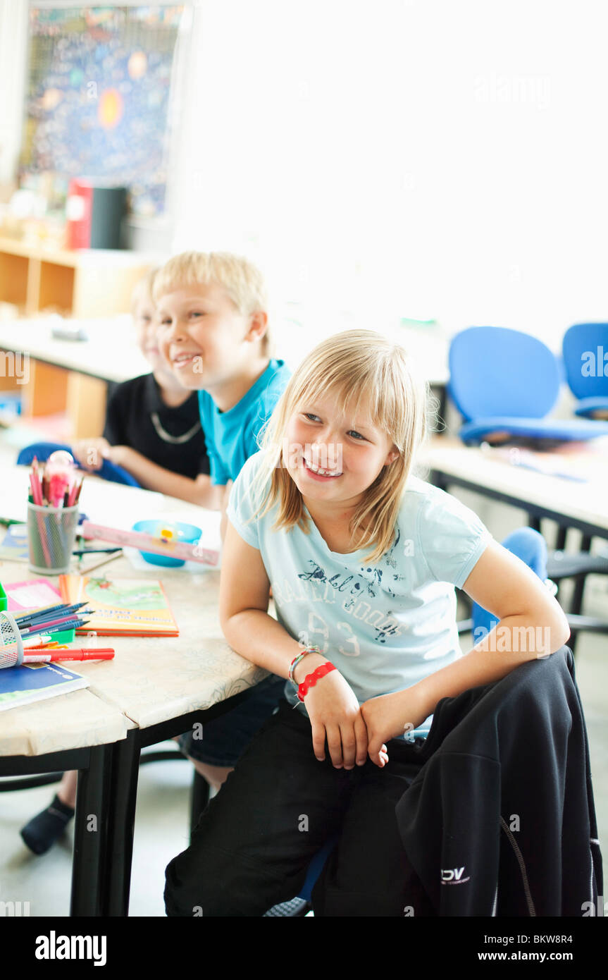 Three pupils in classroom hi-res stock photography and images - Alamy