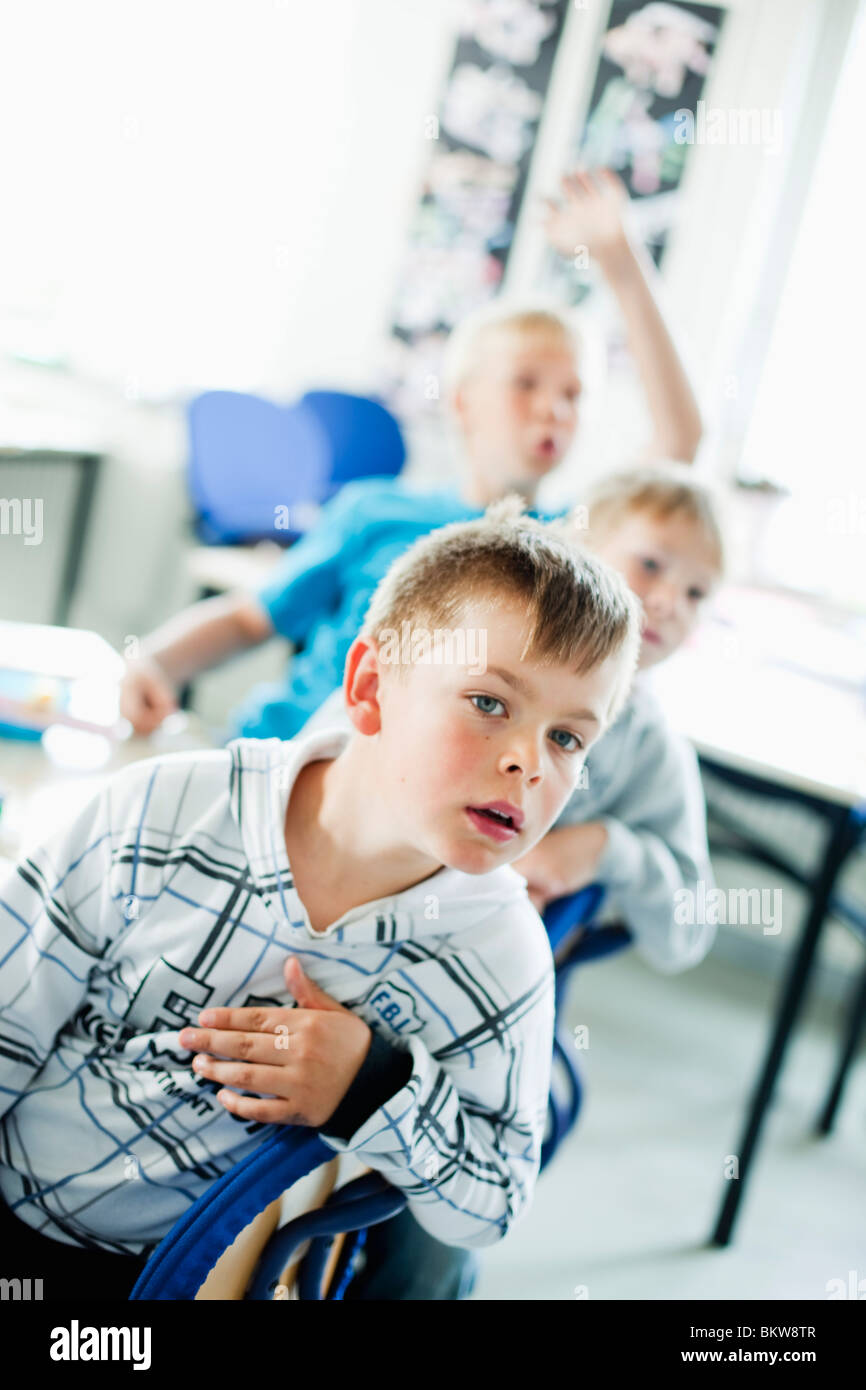 Three pupils in classroom hi-res stock photography and images - Alamy