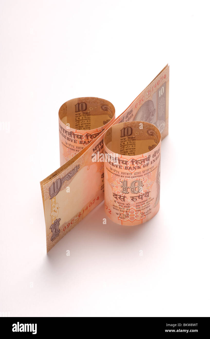 Ten Indian Rupees forming a percentage symbol Stock Photo - Alamy