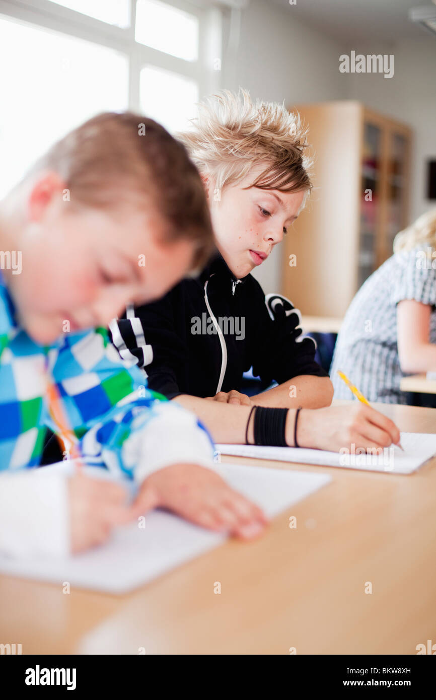 Boys taking test Stock Photo - Alamy