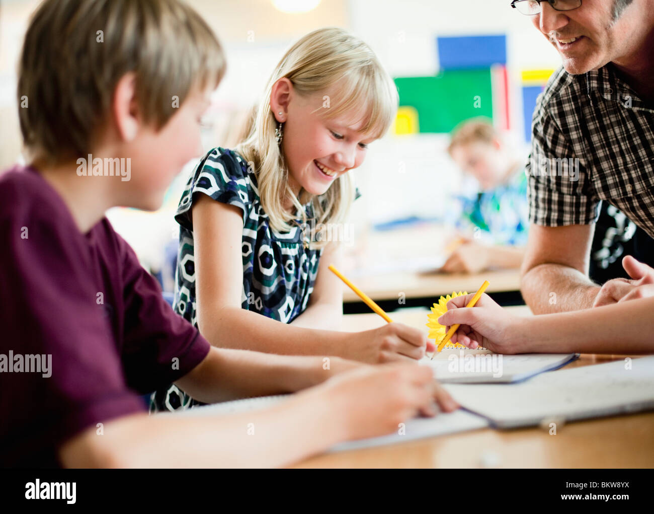 Happy students in classrooms hi-res stock photography and images - Alamy