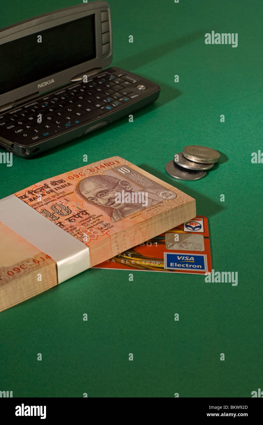 Indian rupee, cellphone and credit card Stock Photo - Alamy