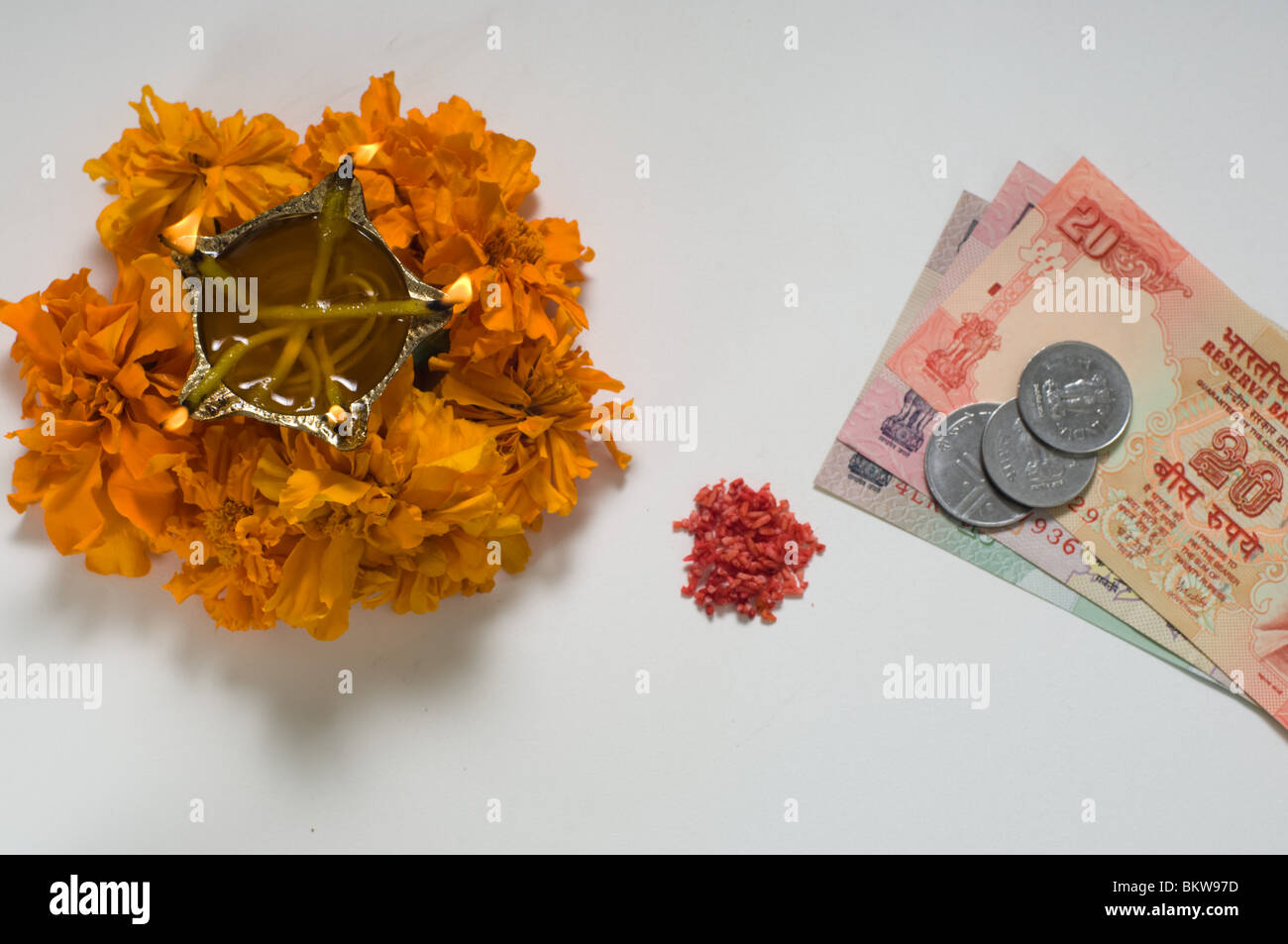 Traditional indian offerings and indian rupees Stock Photo - Alamy