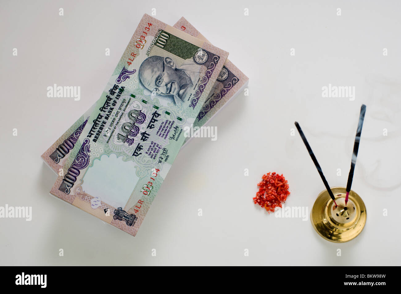 Traditional indian offerings and bundles of indian rupees Stock Photo ...