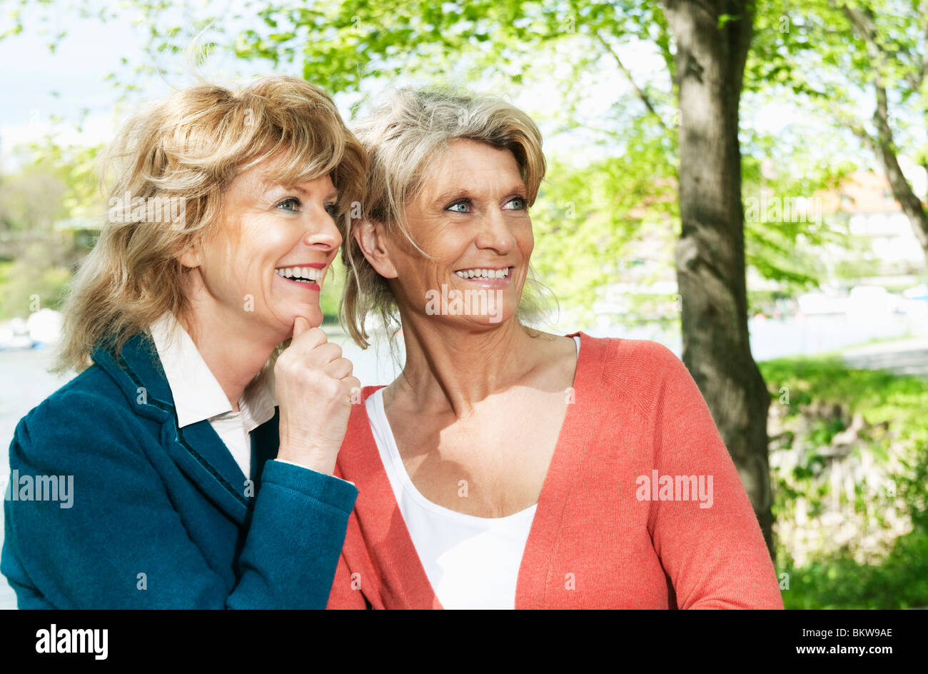 Two women observing Stock Photo - Alamy