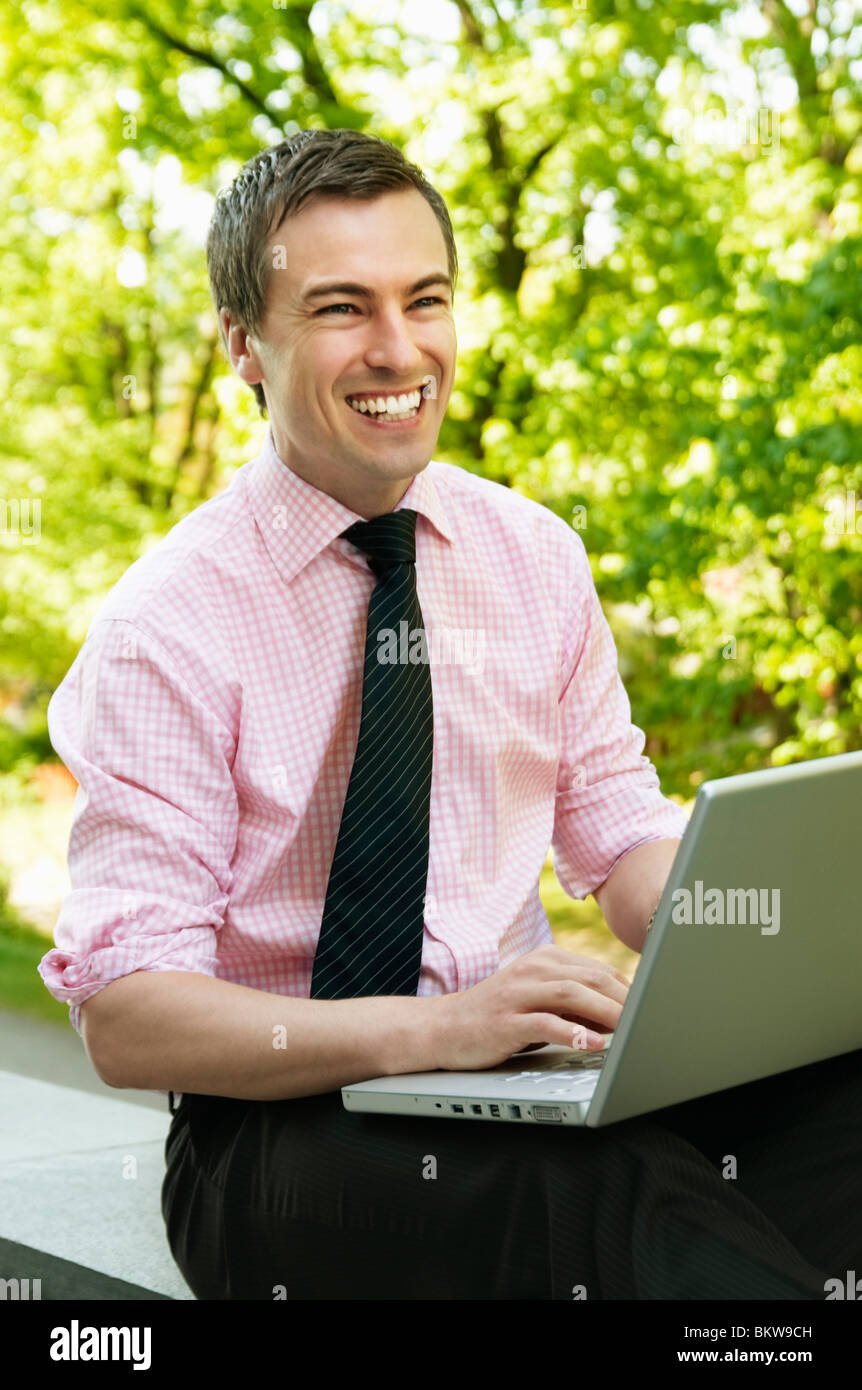 Happy man working outdoors Stock Photo - Alamy