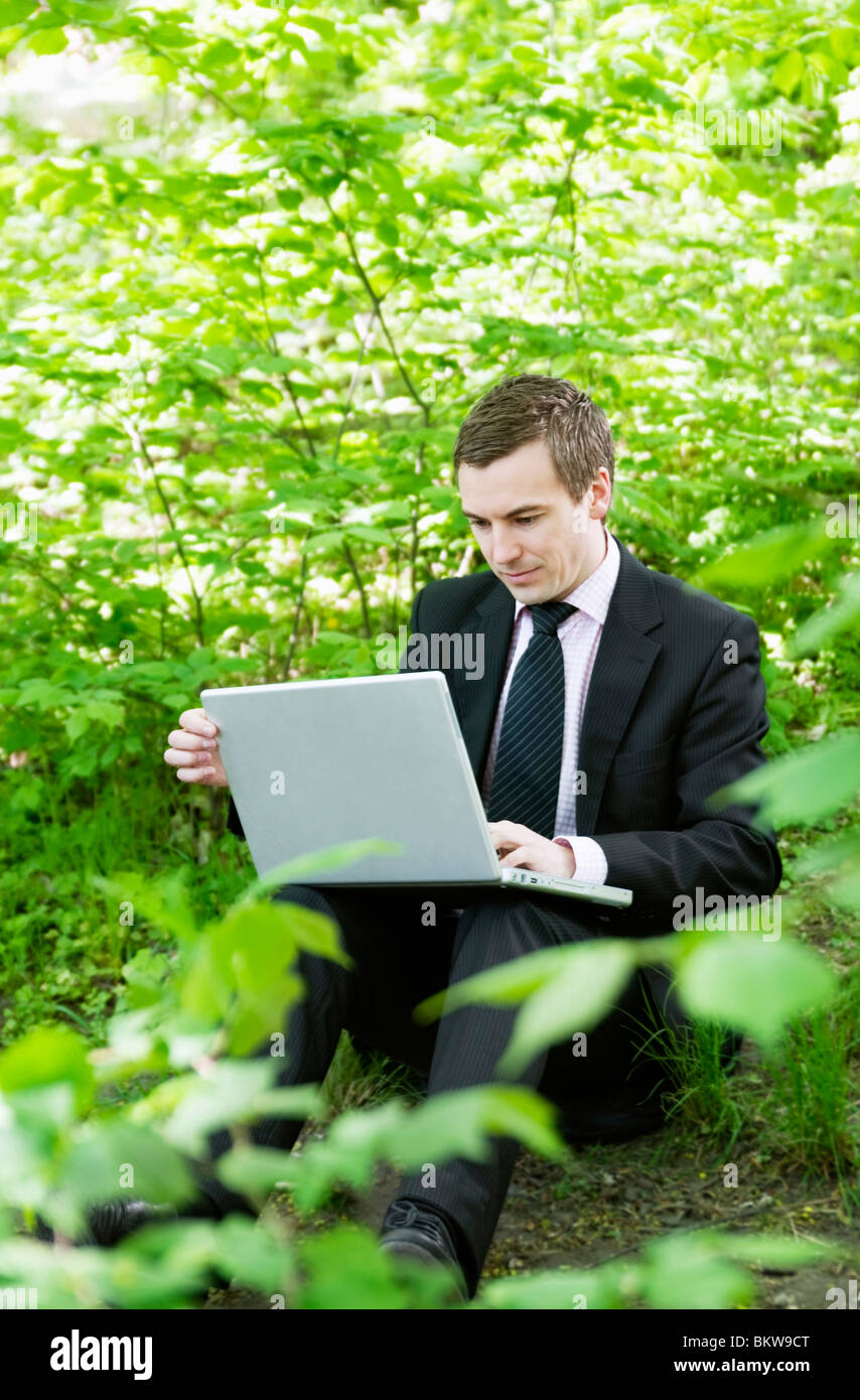 Men in suits in forest hi-res stock photography and images - Alamy
