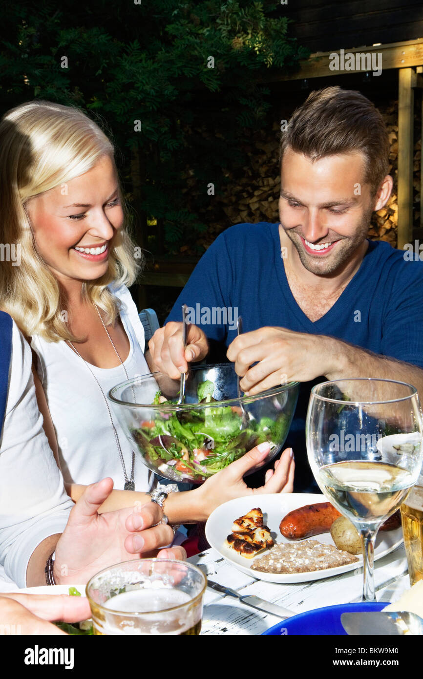 Man grabbing salad Stock Photo - Alamy