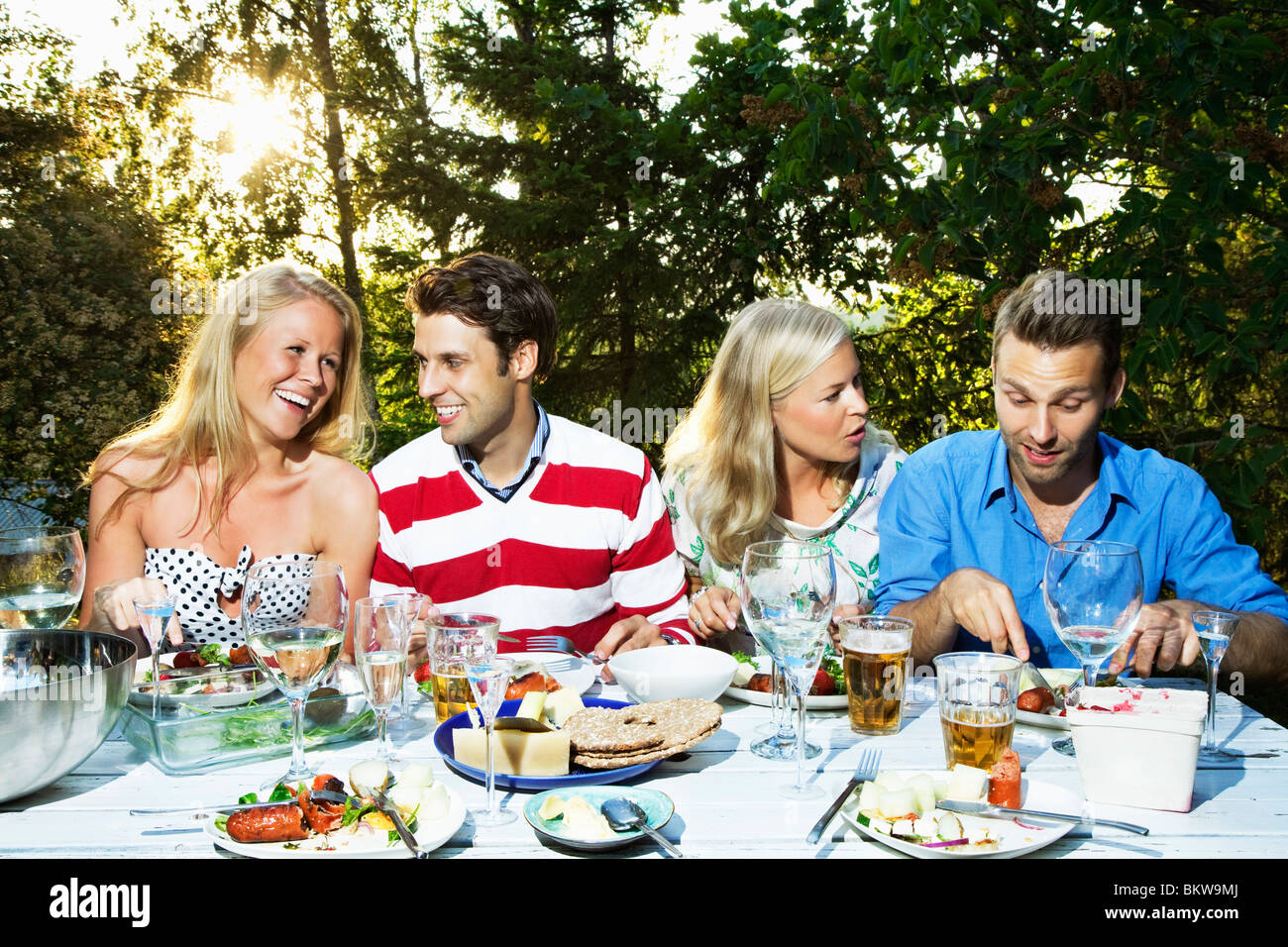 Dinner for four Stock Photo - Alamy