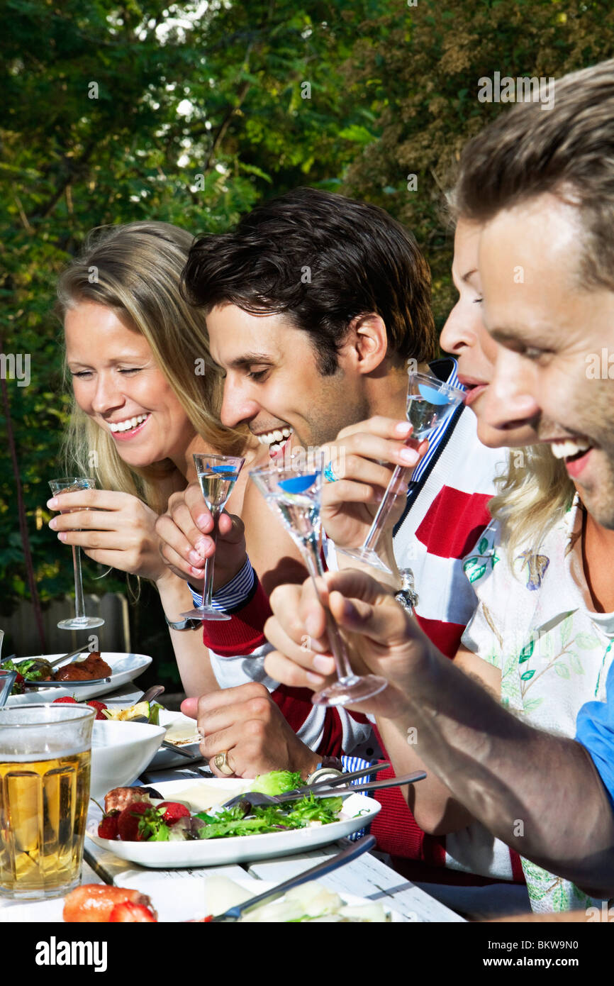 Four happy friends Stock Photo - Alamy