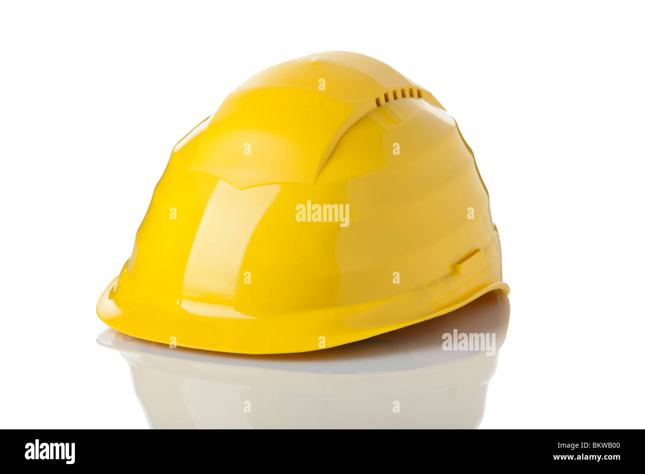 yellow worker's helmet on white background Stock Photo - Alamy