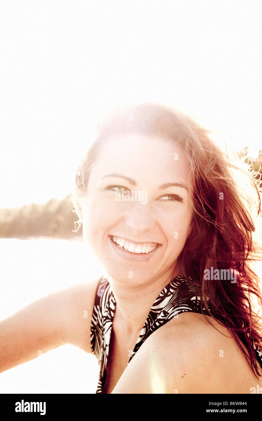 Women face in sun hi-res stock photography and images - Alamy