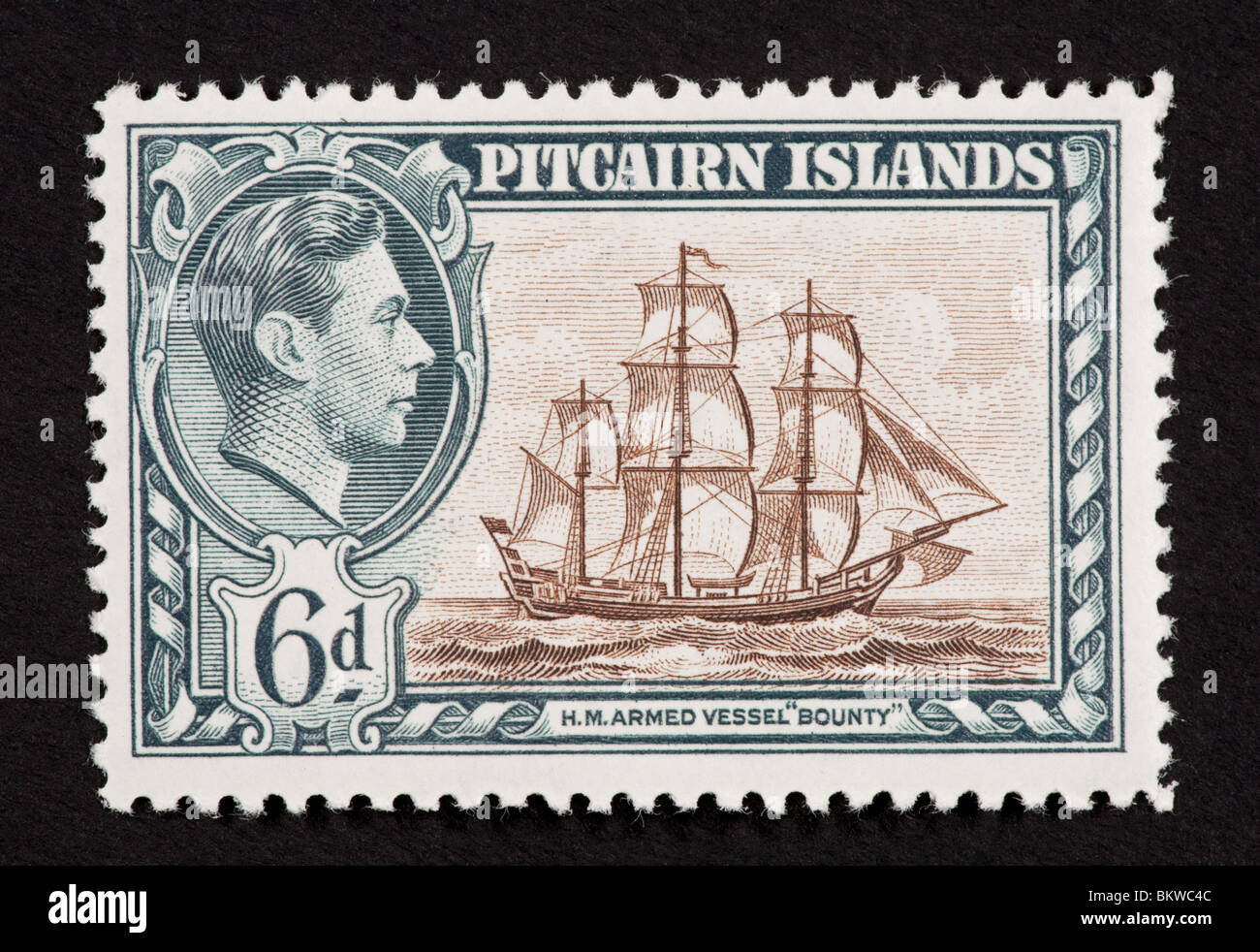 Postage stamp from the Pitcairn Islands depicting the H.M.S. Bounty and ...