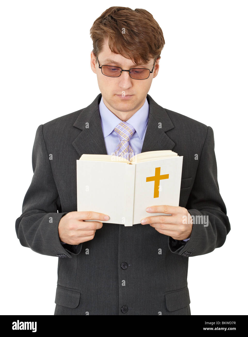 The young man read the Bible carefully Stock Photo - Alamy