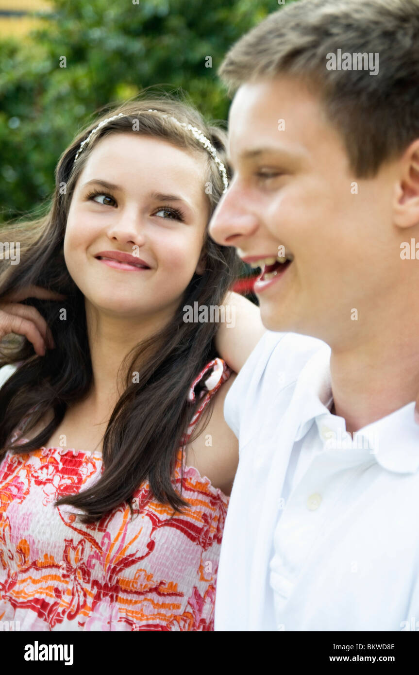 Dark haired siblings Stock Photo - Alamy