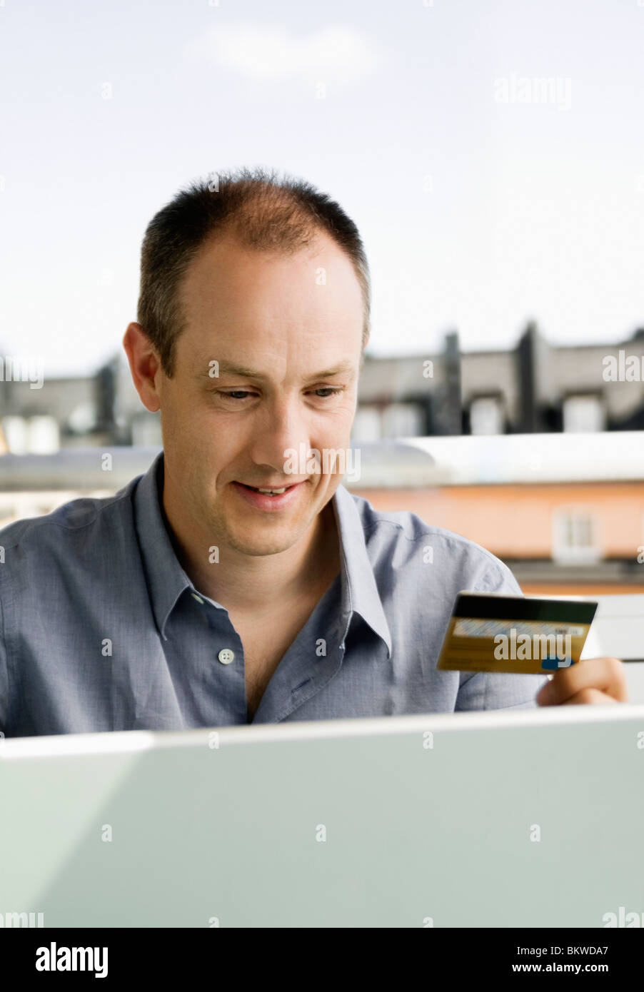 Man with card Stock Photo - Alamy