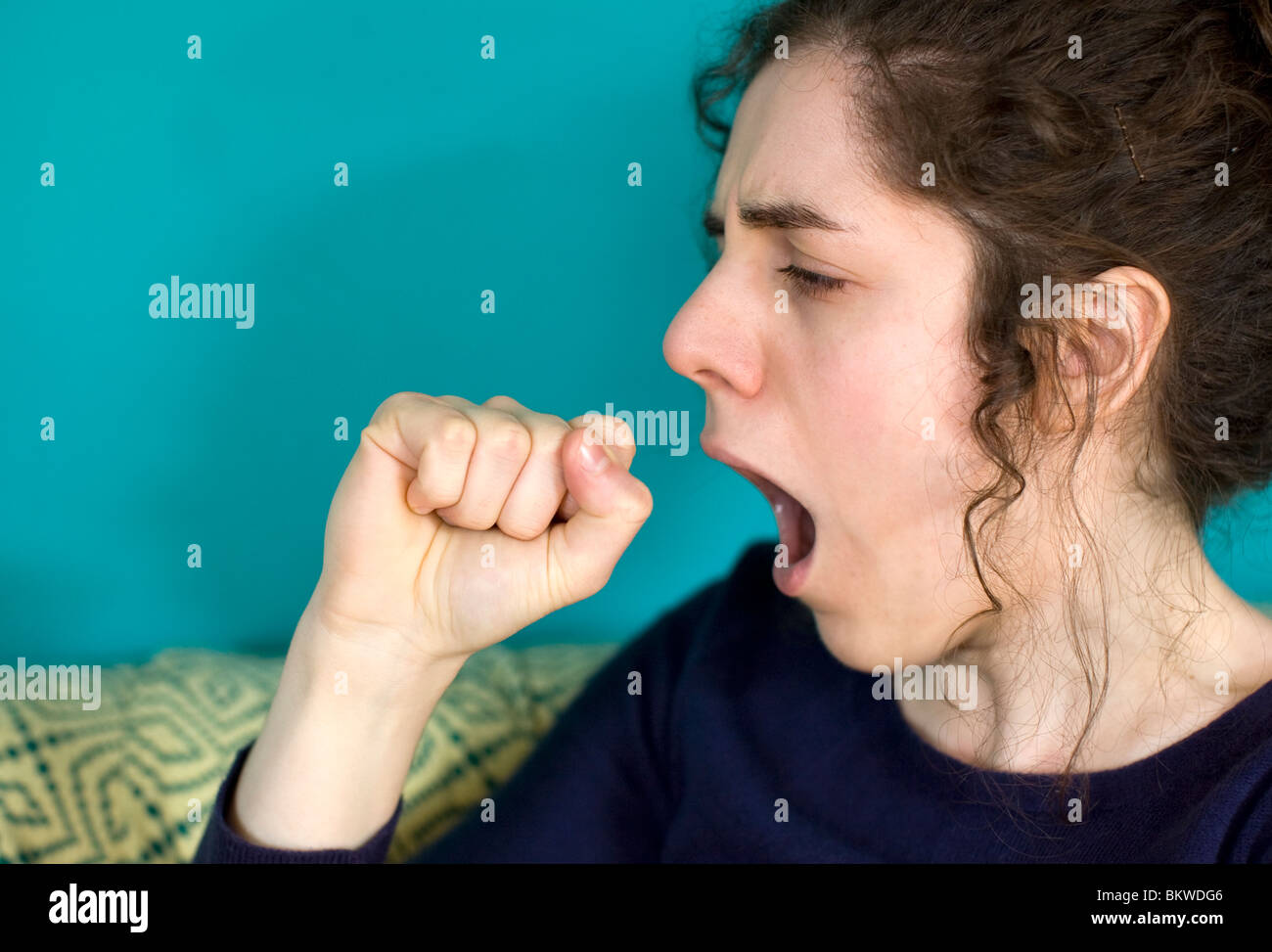 Young person yawning, London: MODEL RELEASED Stock Photo - Alamy