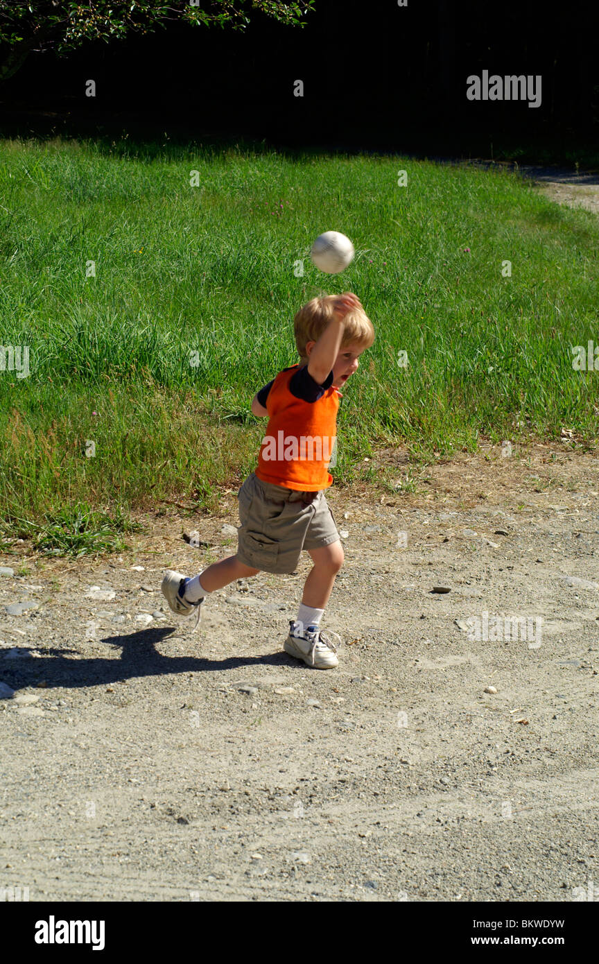 Children throwing a ball school hi-res stock photography and images - Alamy