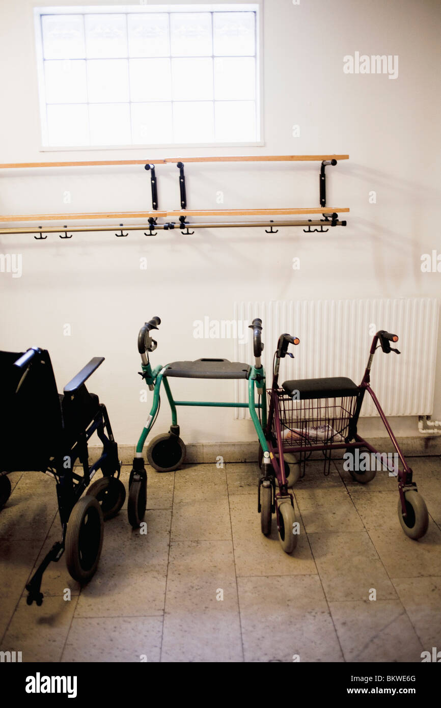 Walking frame and wheelchair Stock Photo - Alamy