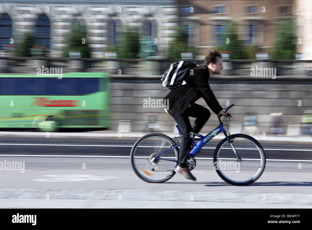 Man biking on cycle lane Stock Photo - Alamy