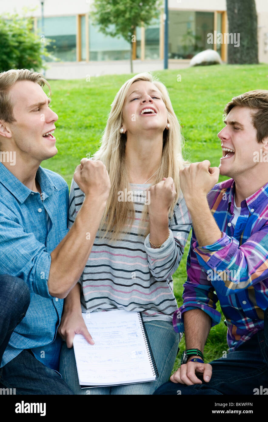 Three happy students Stock Photo - Alamy