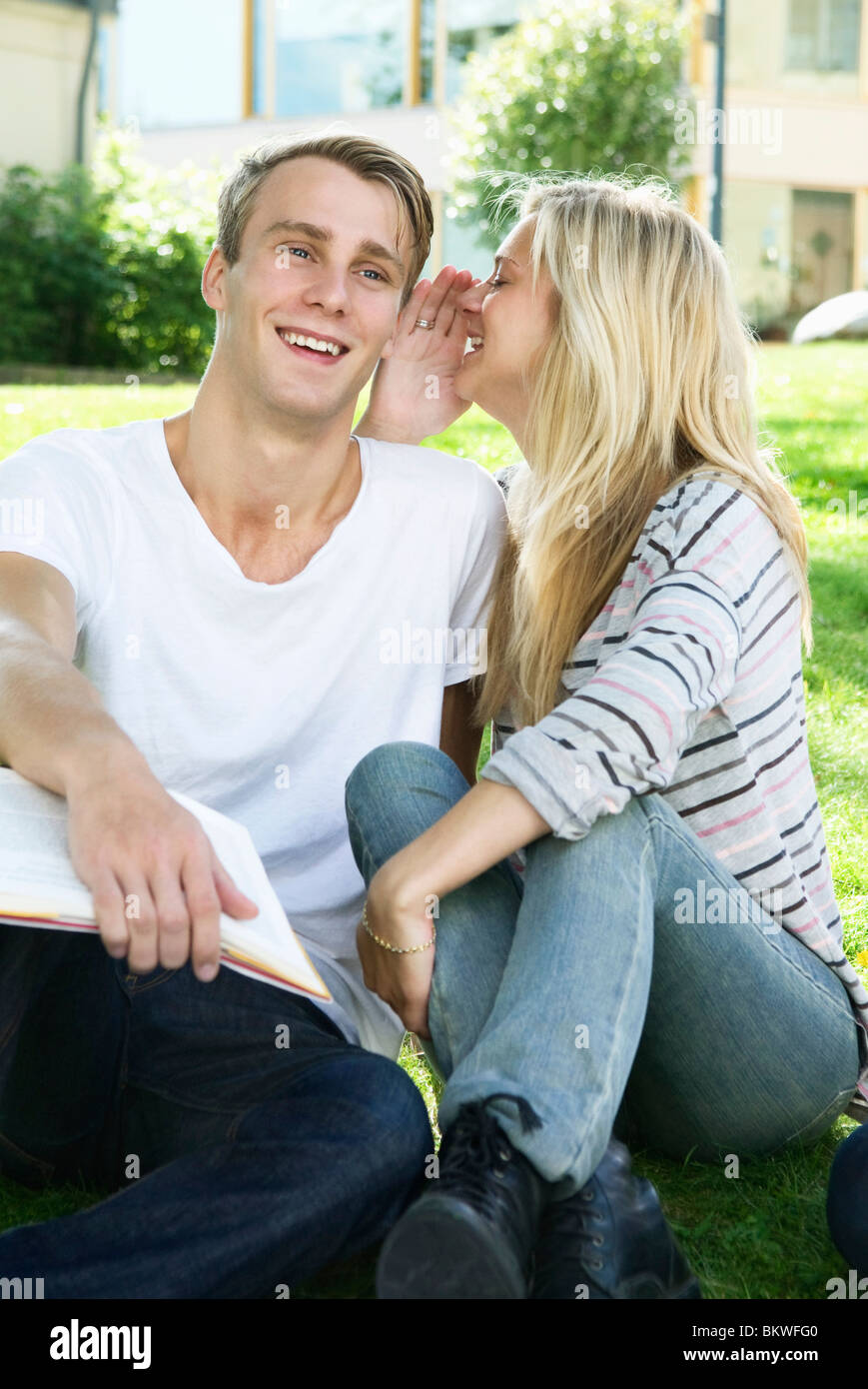 Two students sitting outdoors Stock Photo - Alamy
