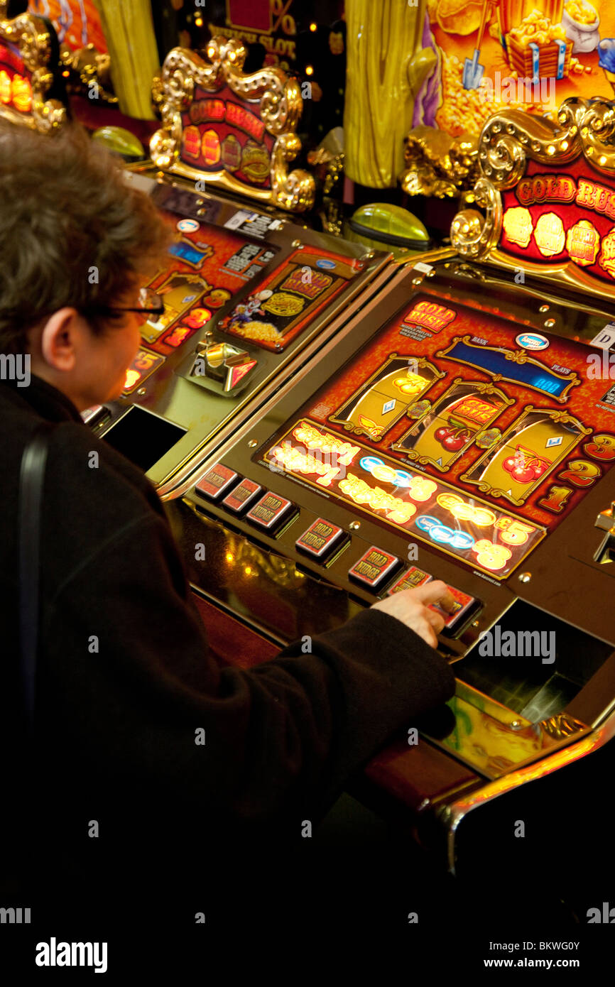 Slot machine coins hi-res stock photography and images - Alamy