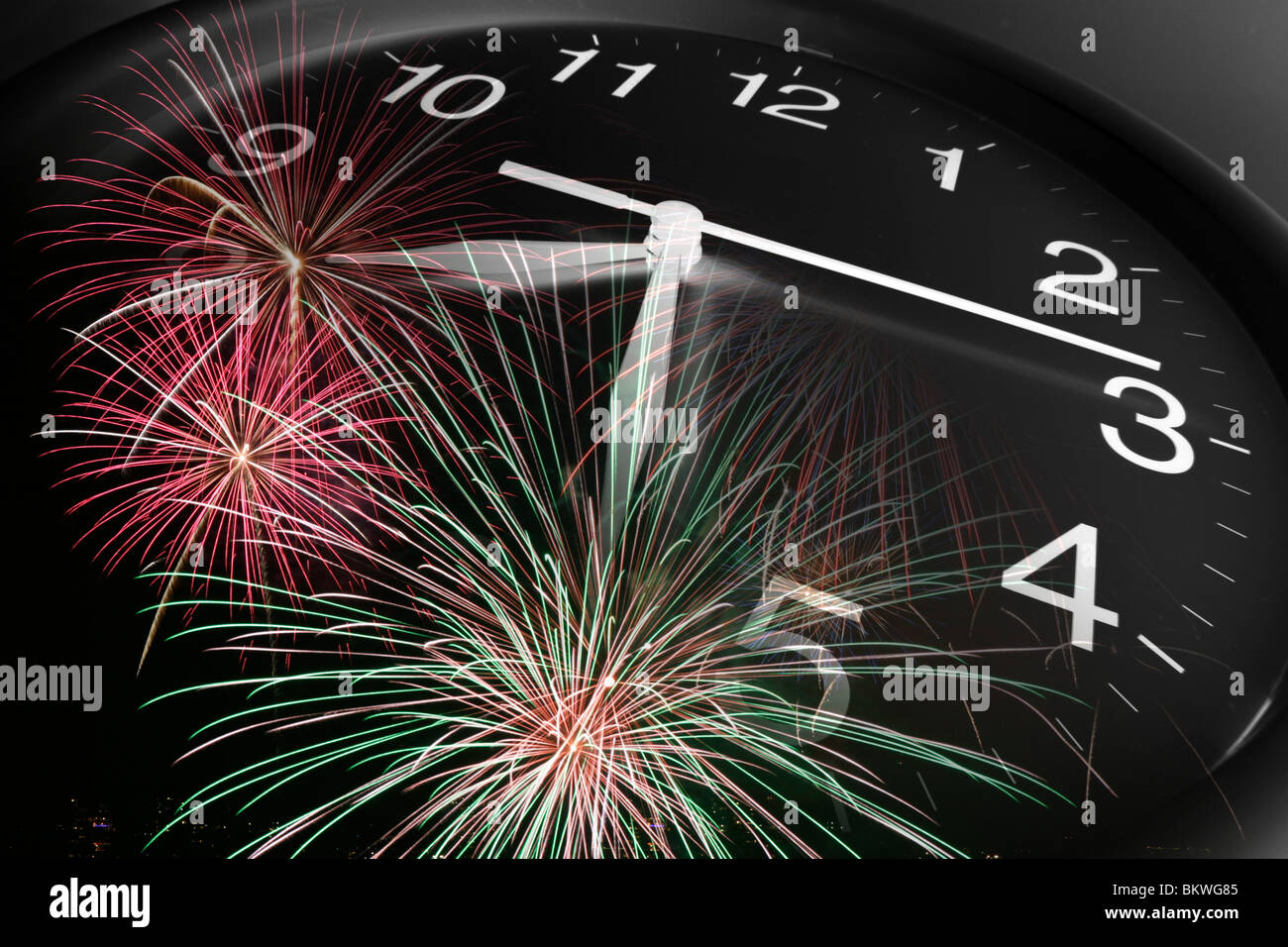 Clock and Fireworks Stock Photo - Alamy