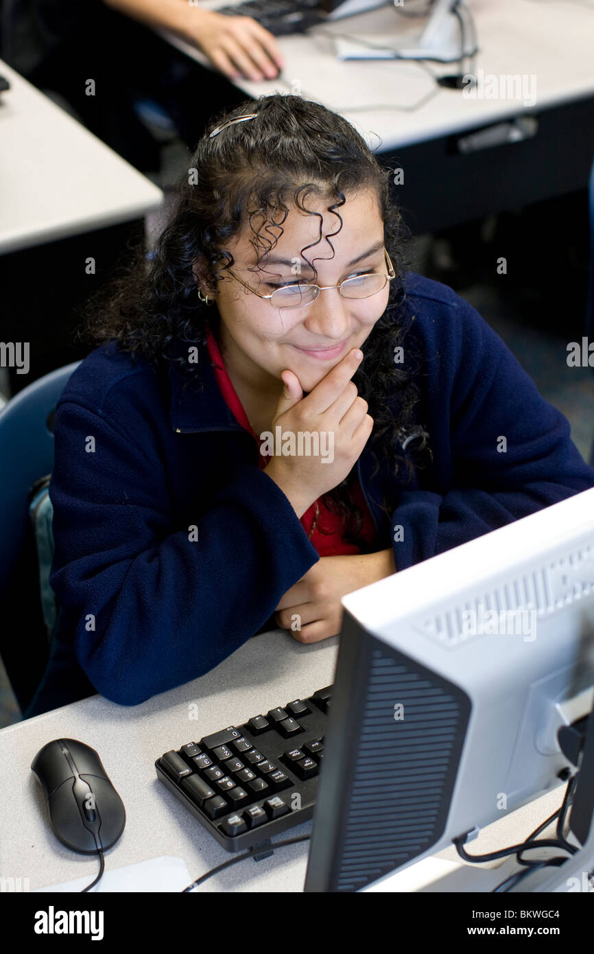 Hispanic female high school student in computer lab at Peak Preparatory ...