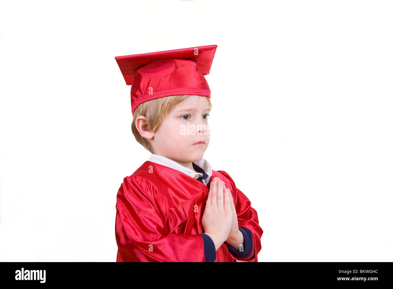 Boy in red graduation gown hi-res stock photography and images - Alamy