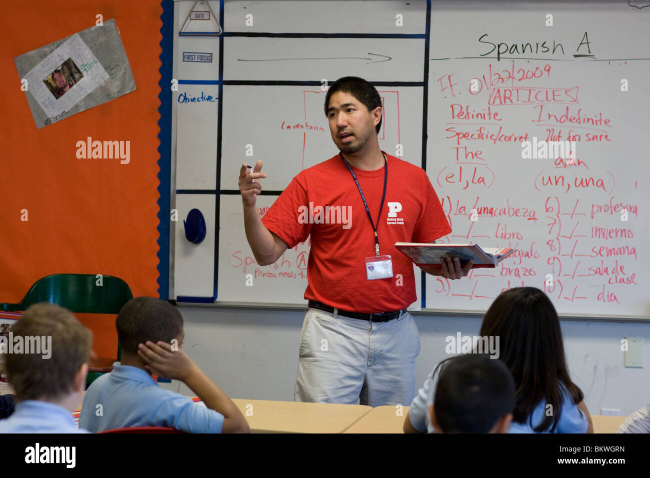Male Asian-American teacher conducts middle school Spanish class at ...