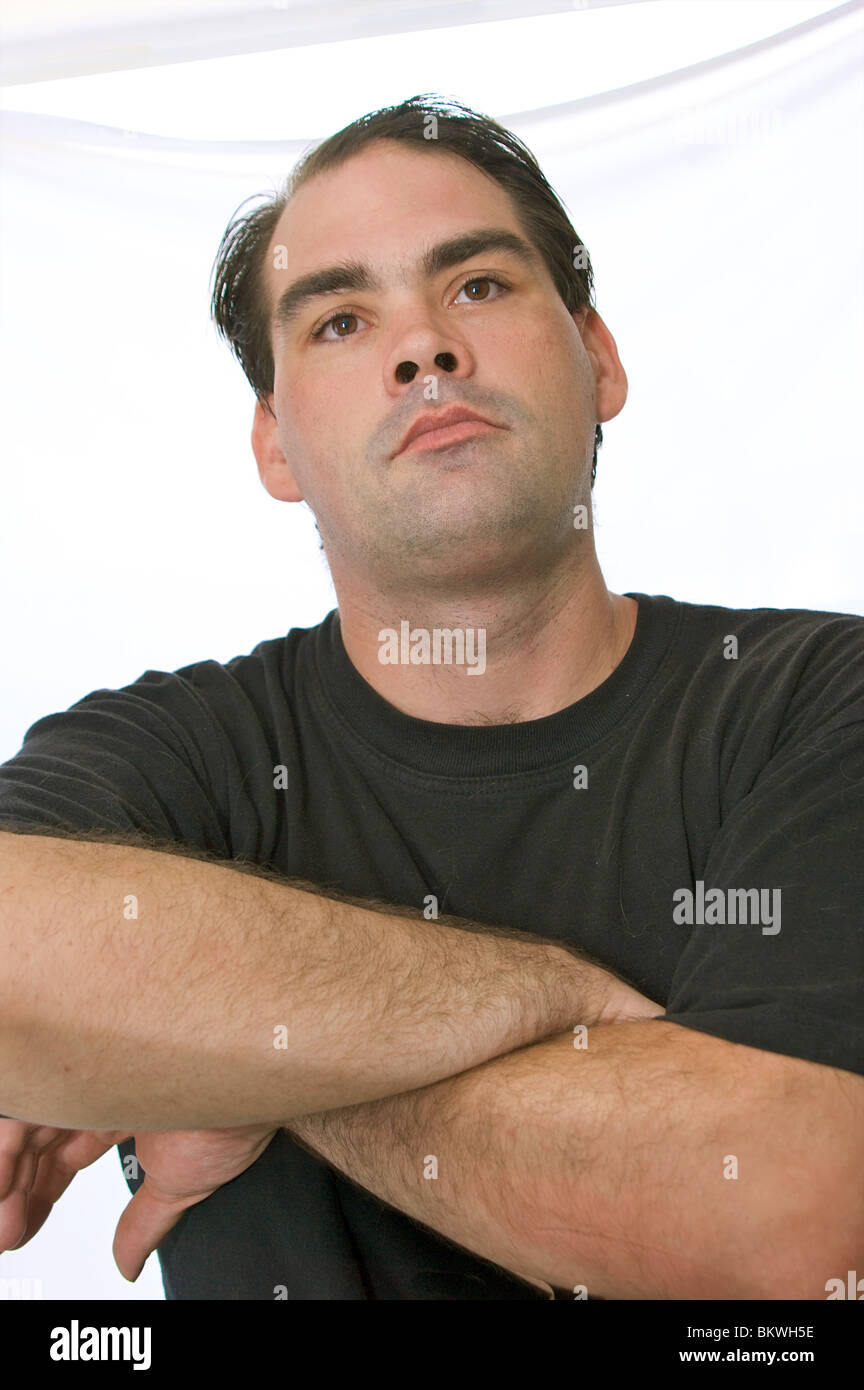 Defensive arms crossed hi-res stock photography and images - Alamy
