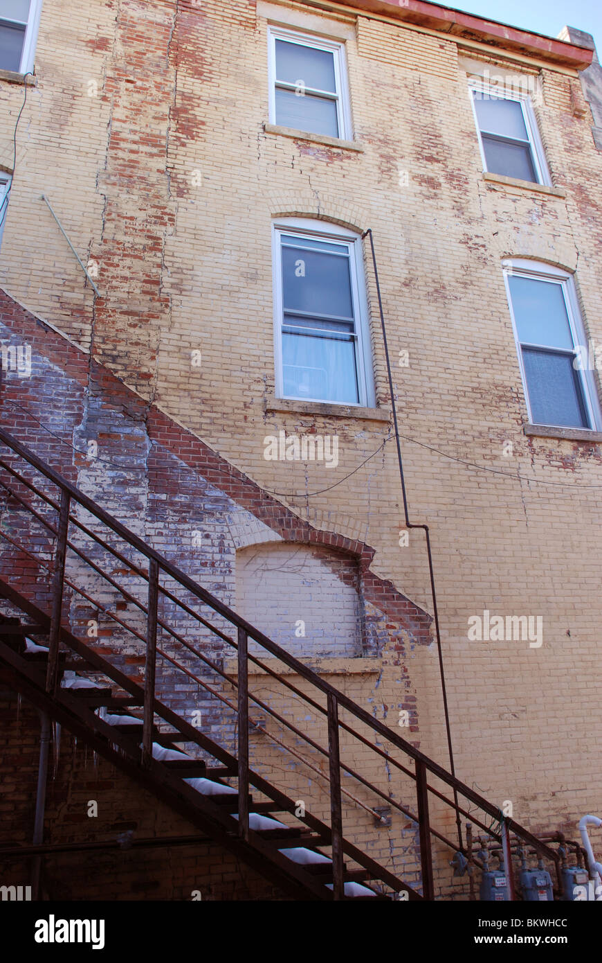 Fire escape on old brick building Stock Photo - Alamy