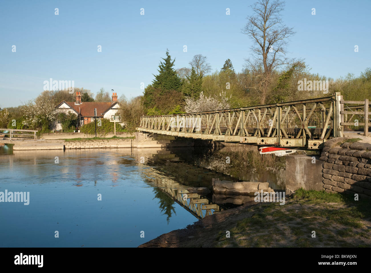 Wooden footbridge over the River Thames at Bossom's Boatyard in Port ...
