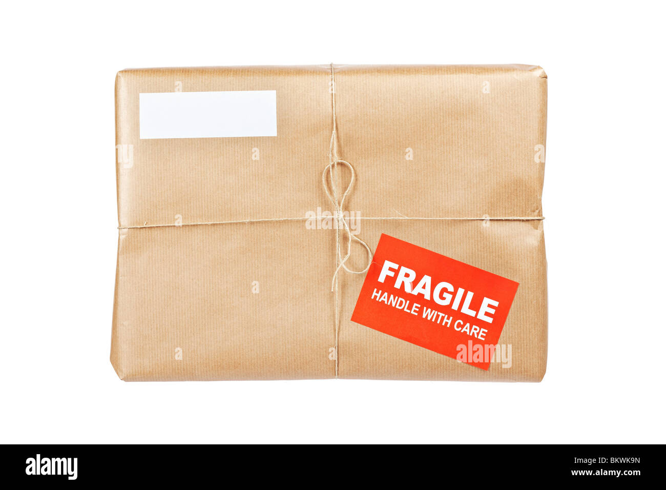 A fragile parcel wrapped in brown paper and tied with rough twine ...