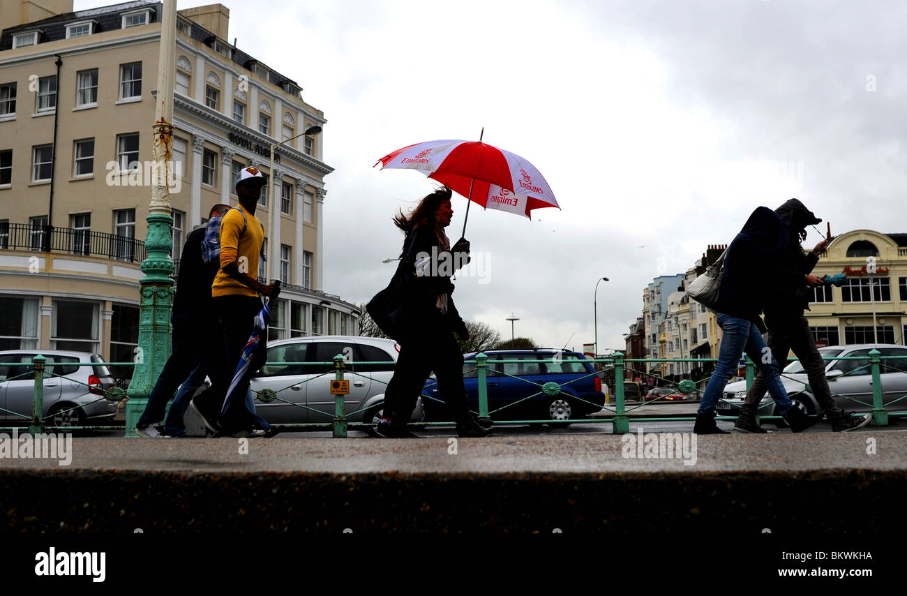 People walking windy day hi-res stock photography and images - Alamy