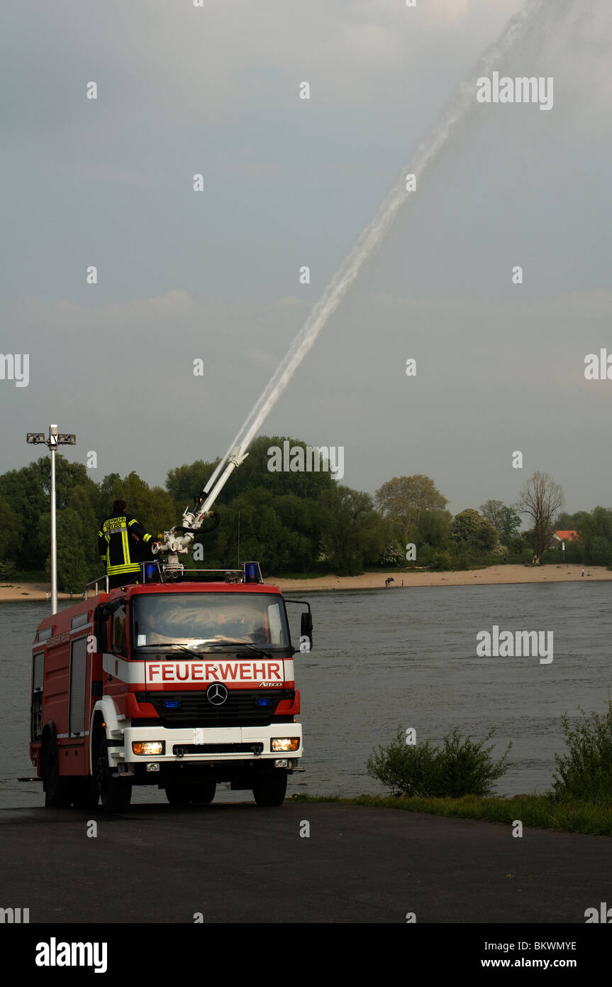 The fireman working near fire-engine(Germany Stock Photo - Alamy