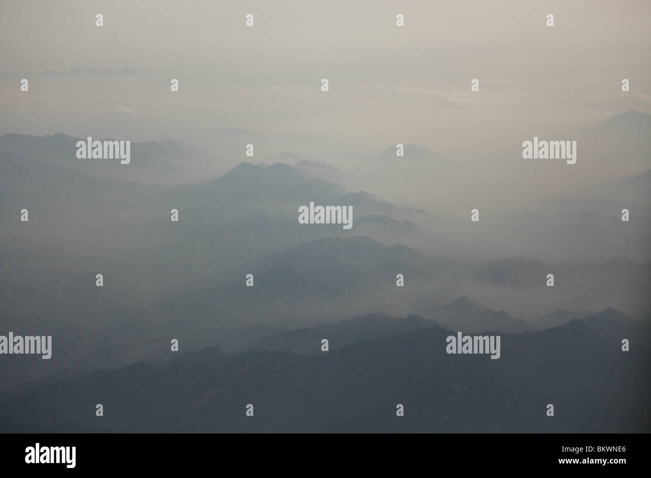 Mountains in the mist Stock Photo - Alamy