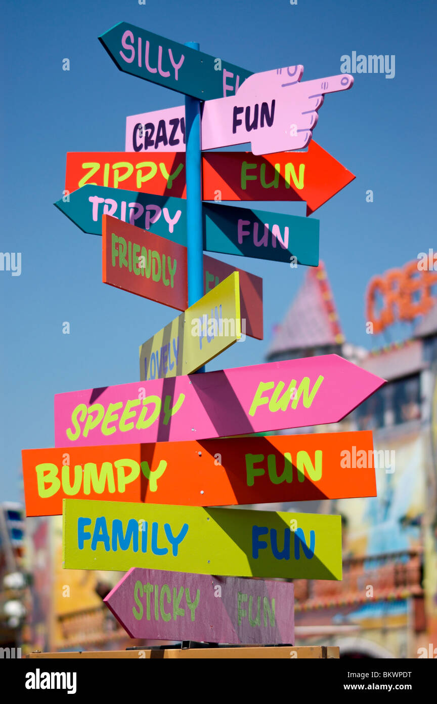 Stock photograph of carnival signs showing way to different kinds of ...