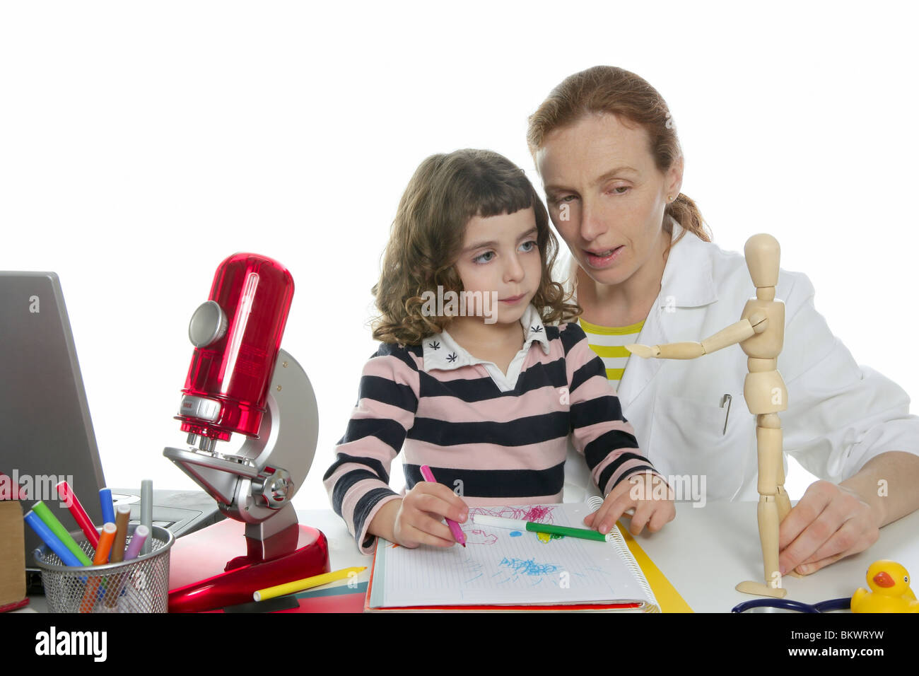 doctor natural sciences teaching pupil at school Stock Photo - Alamy