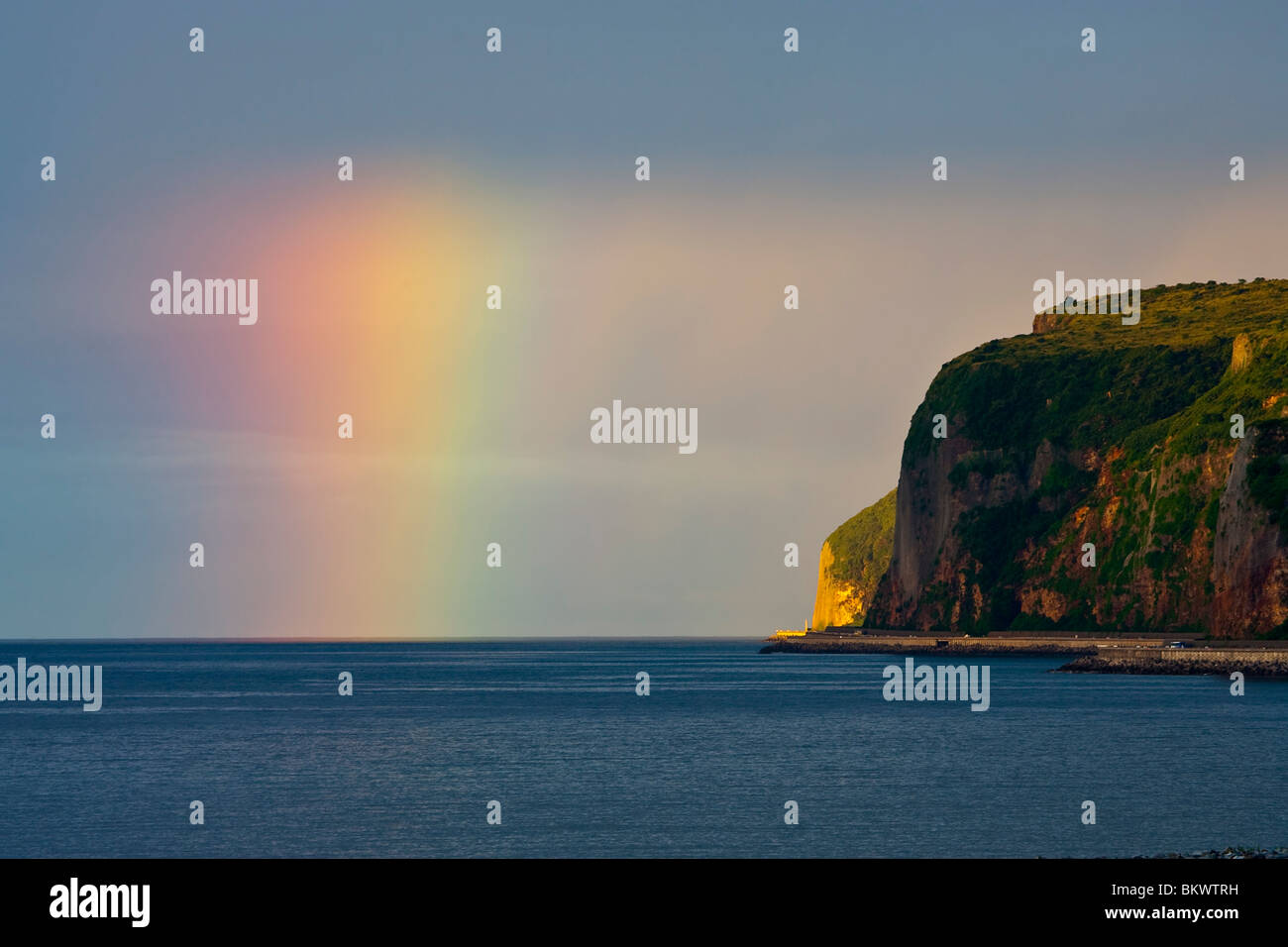 Rainbow Cliffs Clouds Sea Seascape Stock Photo - Alamy