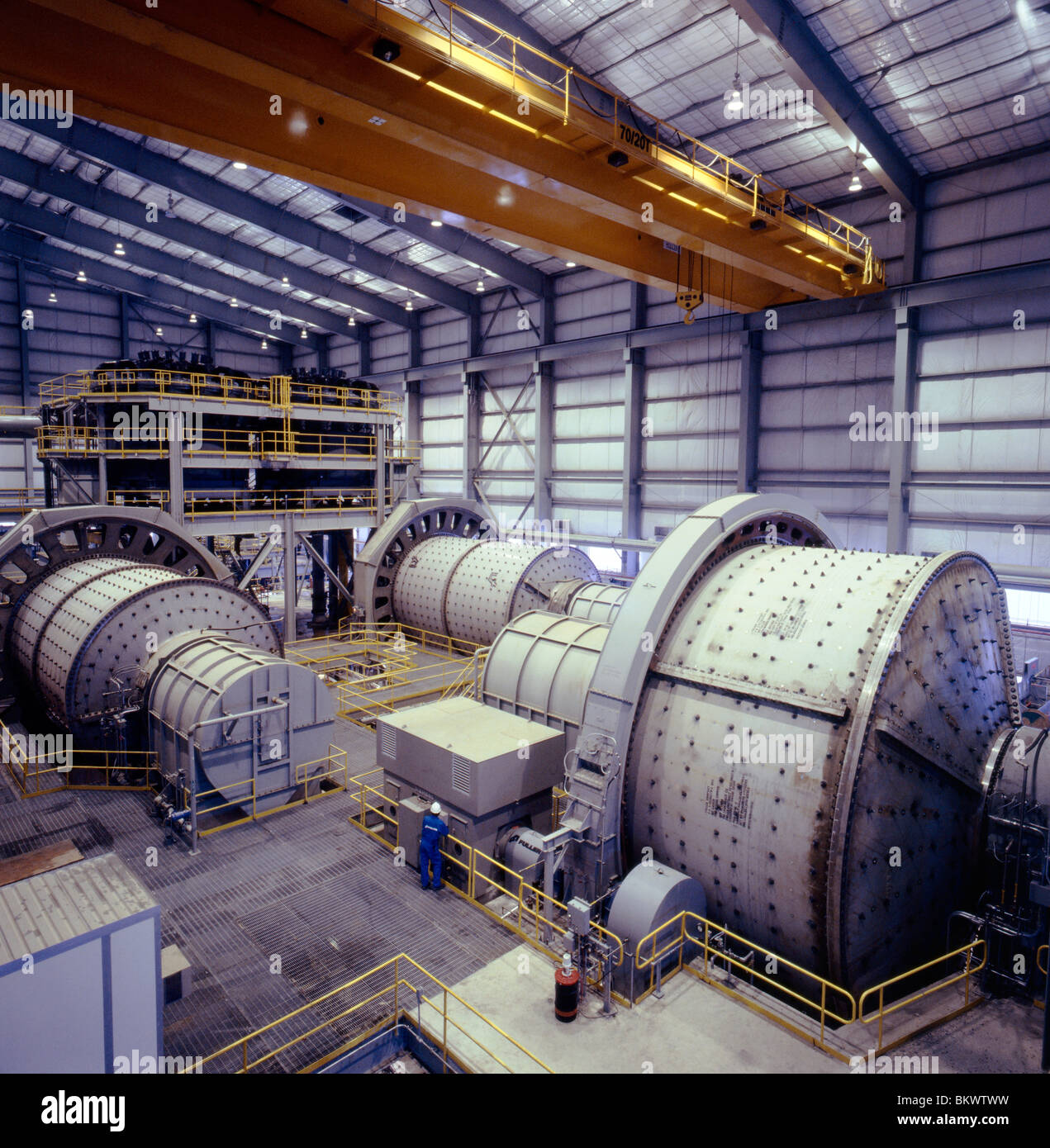 Male engineer working with grinding equipment at one of the world's ...