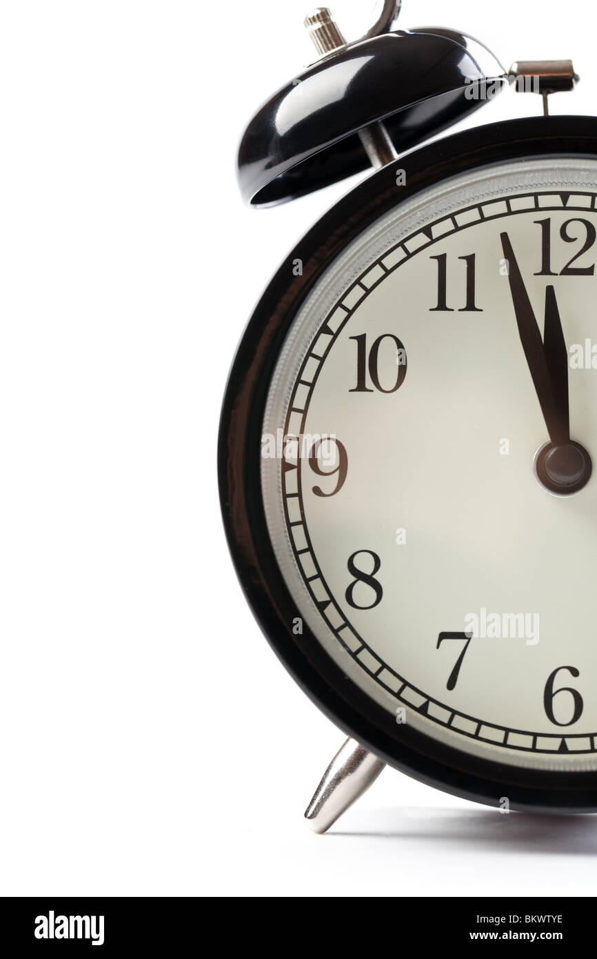 detail of alarm clock on white background Stock Photo - Alamy