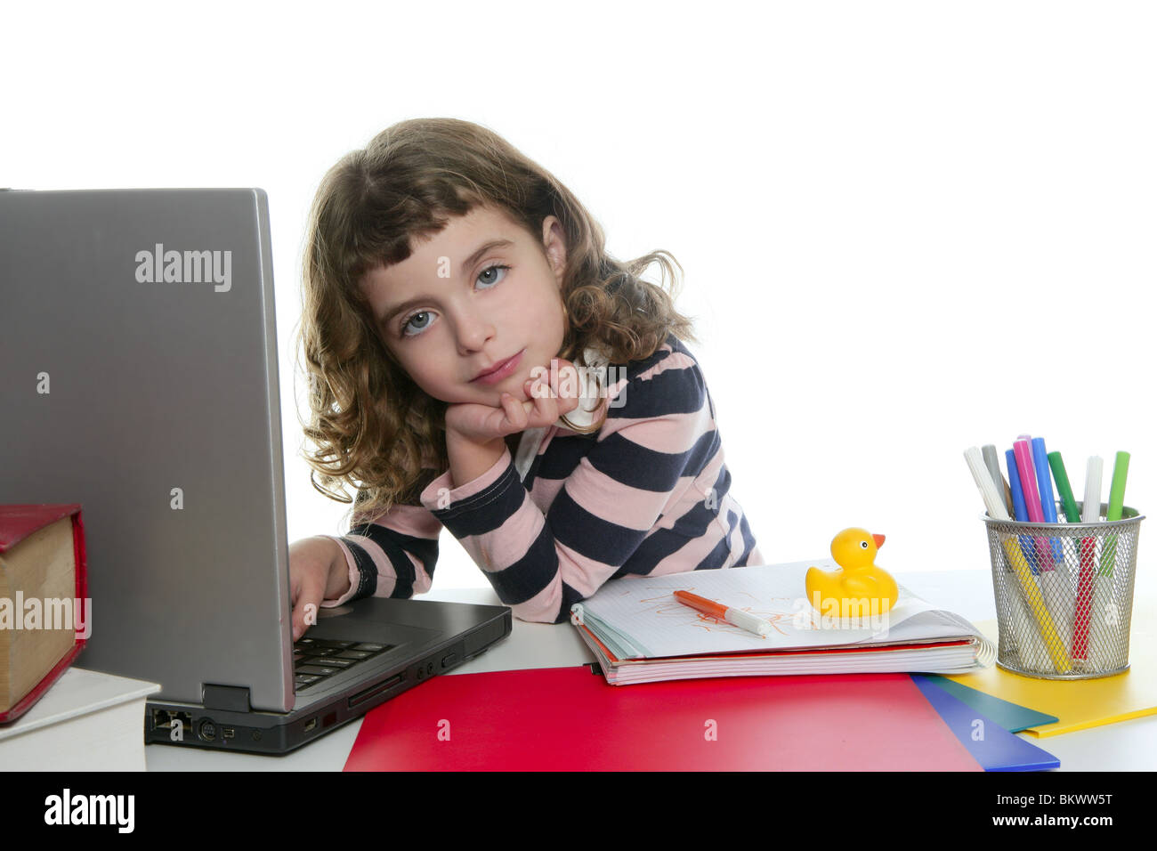 books and laptop desk with little girl student posing portrait Stock ...