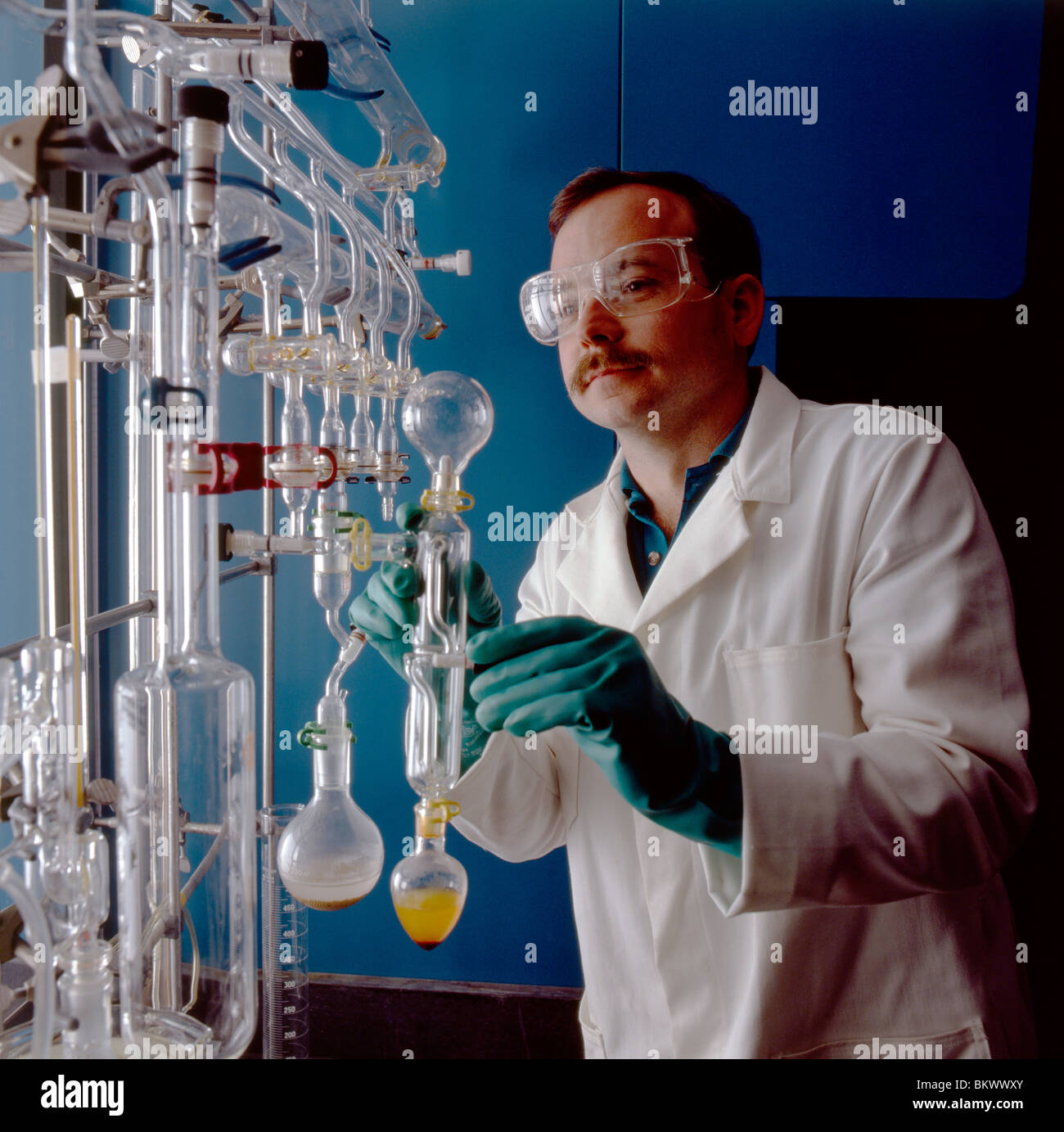 Male chemist wearing safety equipment in the research & development ...