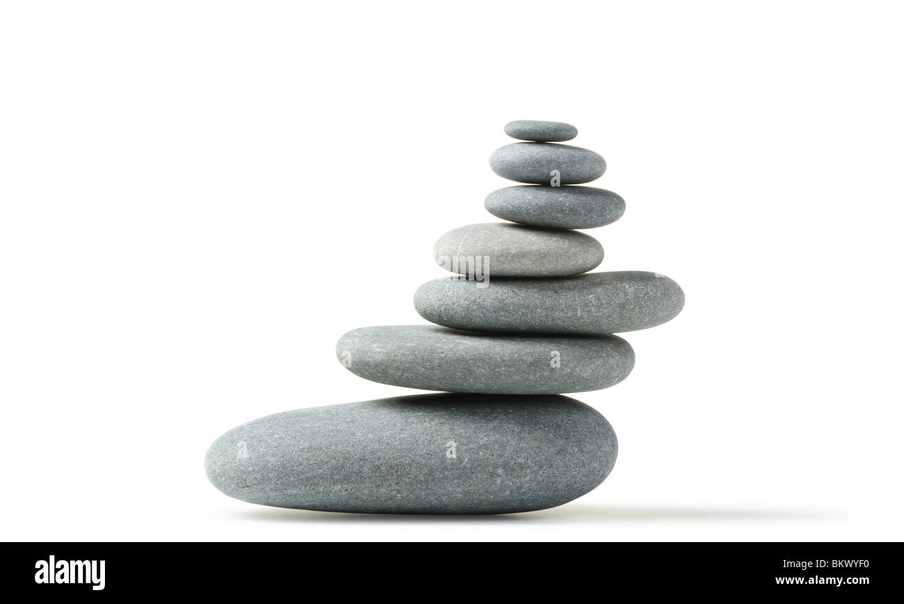Balance. A construction from a pebble. It is isolated on a white ...