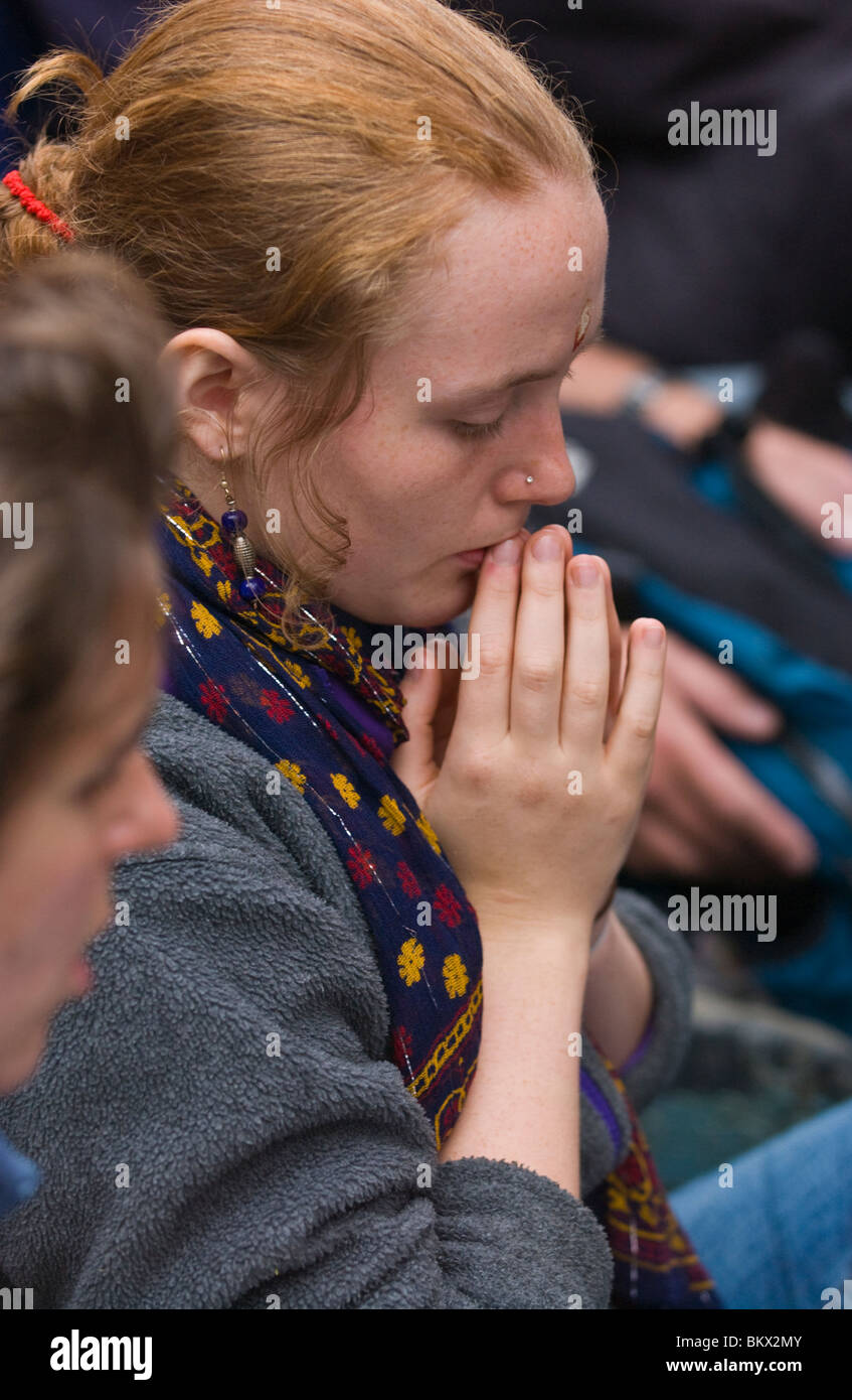 Visiting protesters chanting and praying outside the stall of sacred ...